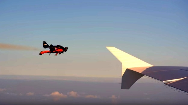 Shocking! Real-life Iron Man flies dangerously close to passenger jet ...