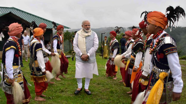 Prime Minister Narendra Modi tries his hand at drums in Mawphlang, Asia ...