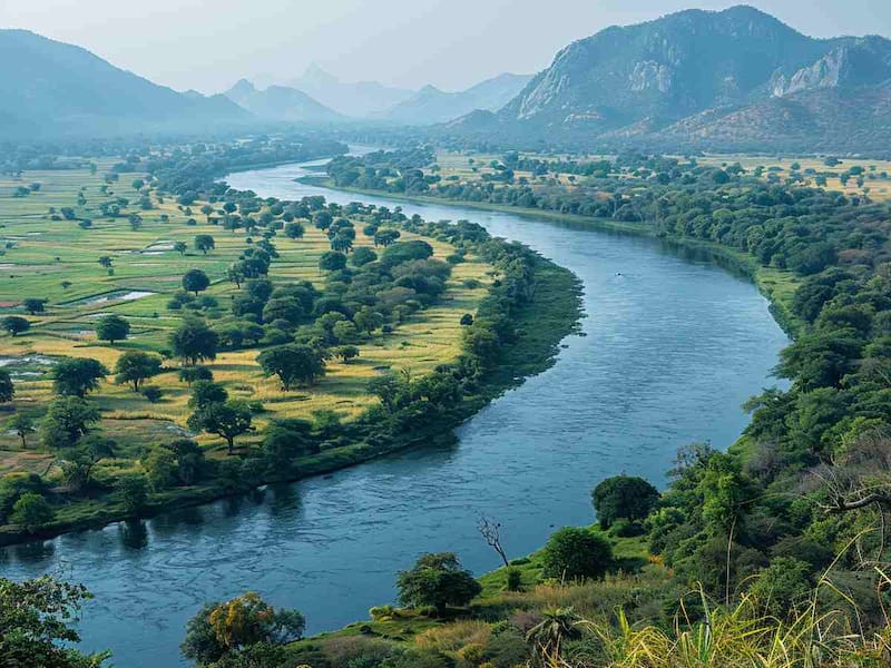 Experience The Blissful Greenery And Rivers That Flow Through The ...